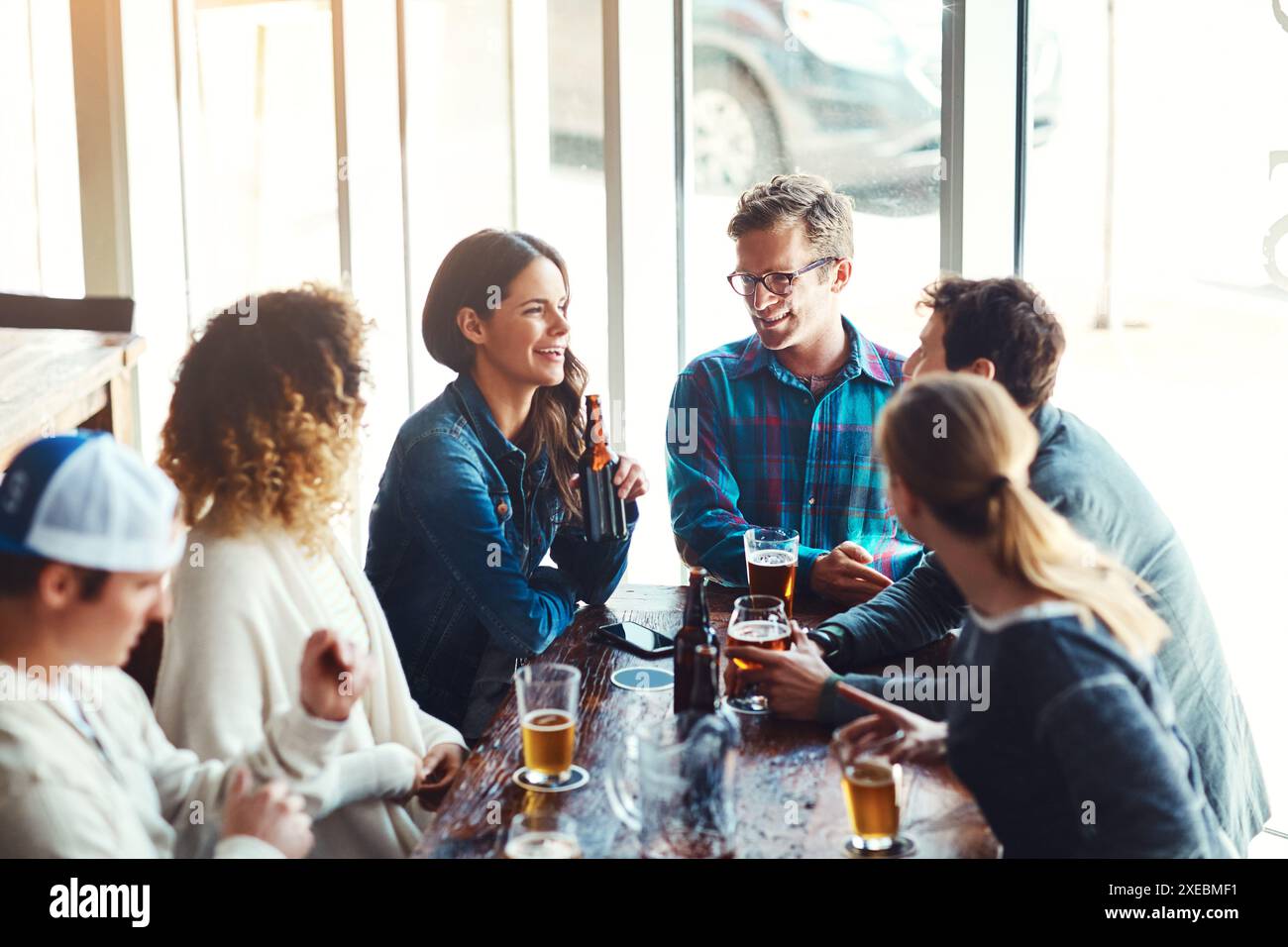 Bar, laughing and group with alcohol to enjoy, break and fun in weekend ...