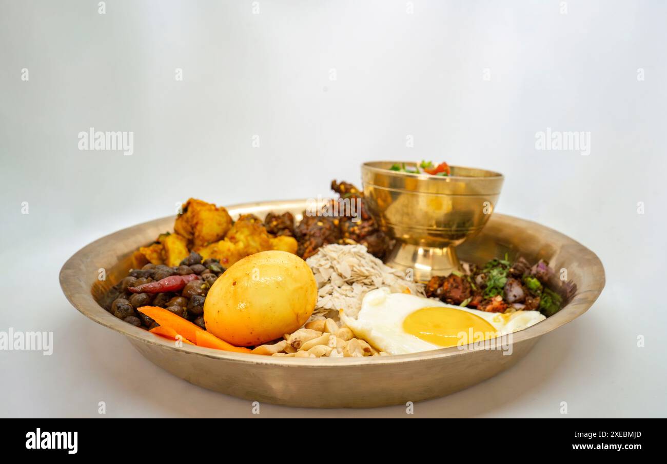 Newari Khaja Set Typical Nepali Thali with Rice Flakes, Choyila, Eggs ...