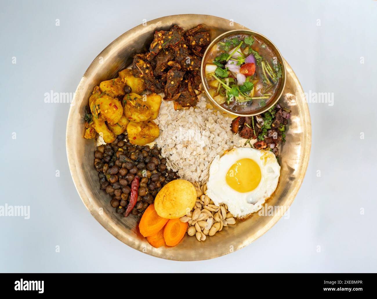 Newari Khaja Set Typical Nepali Thali with Rice Flakes, Choyila, Eggs ...