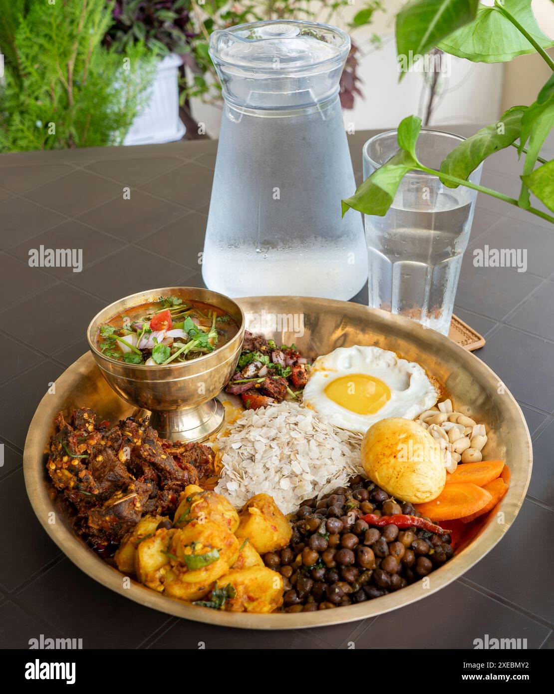 Newari Khaja Set Typical Nepali Thali with Rice Flakes, Choyila, Eggs ...