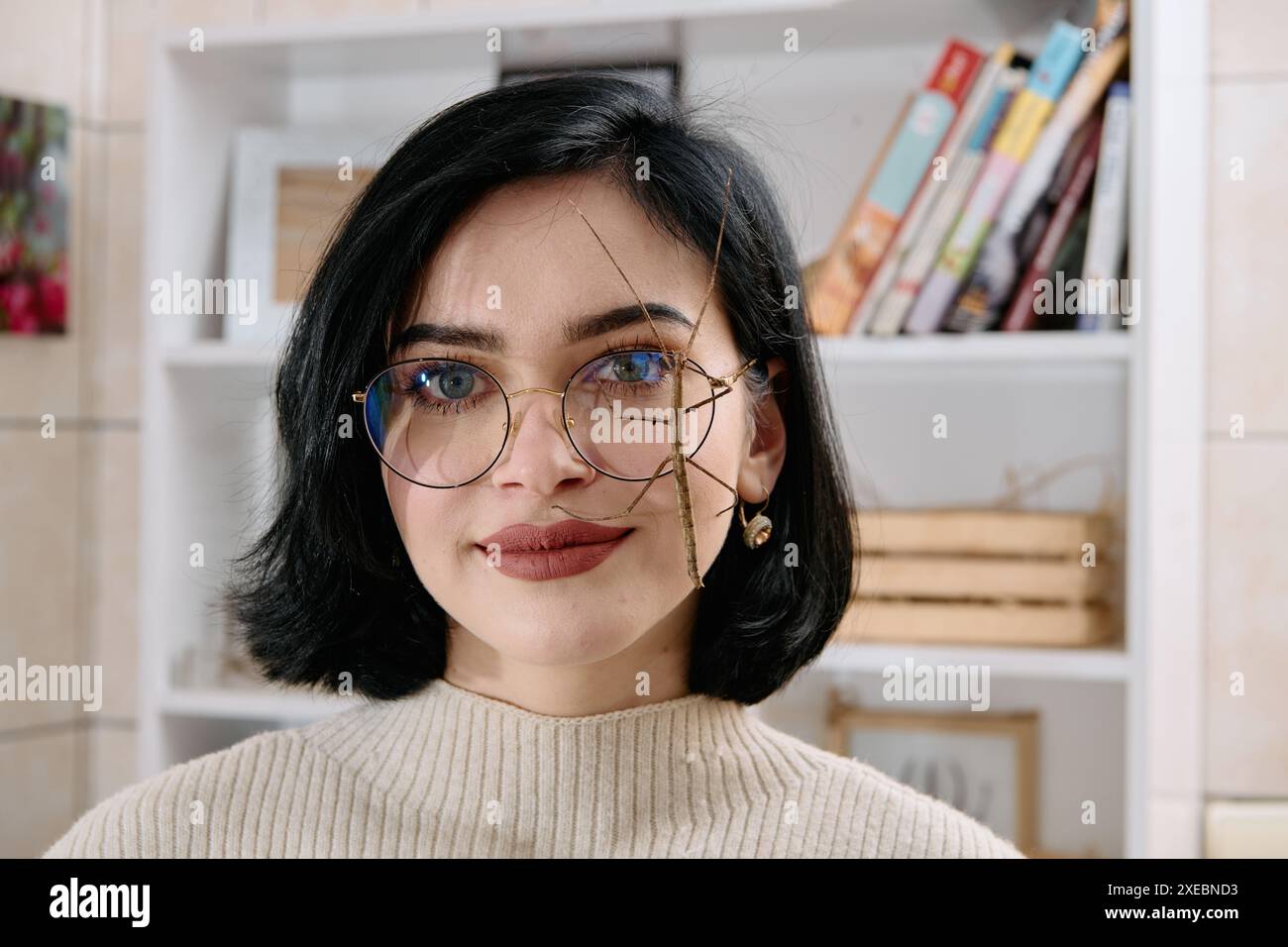 Young Woman Captured in a Beautiful Moment with Her Stick Insect ...