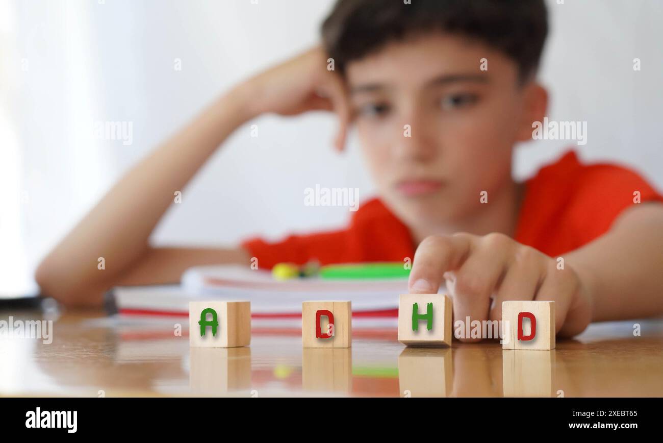 child with attention deficit disorder frustrated doing homework ...