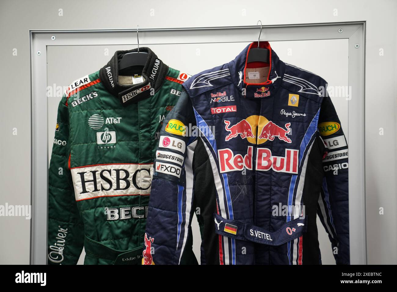 The race suits worn by Eddie Irvine for Jaguar and Sebastian Vettel for ...