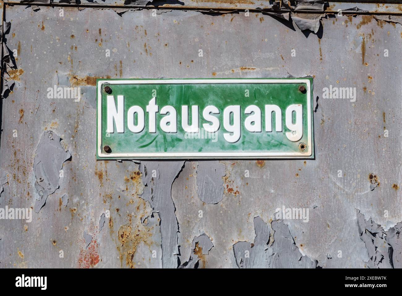 Old green fire exit sign hi-res stock photography and images - Alamy