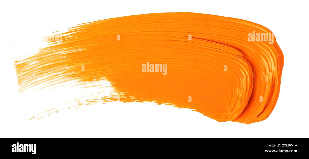 Orange paint brush stroke isolated on white background. Abstract art ...