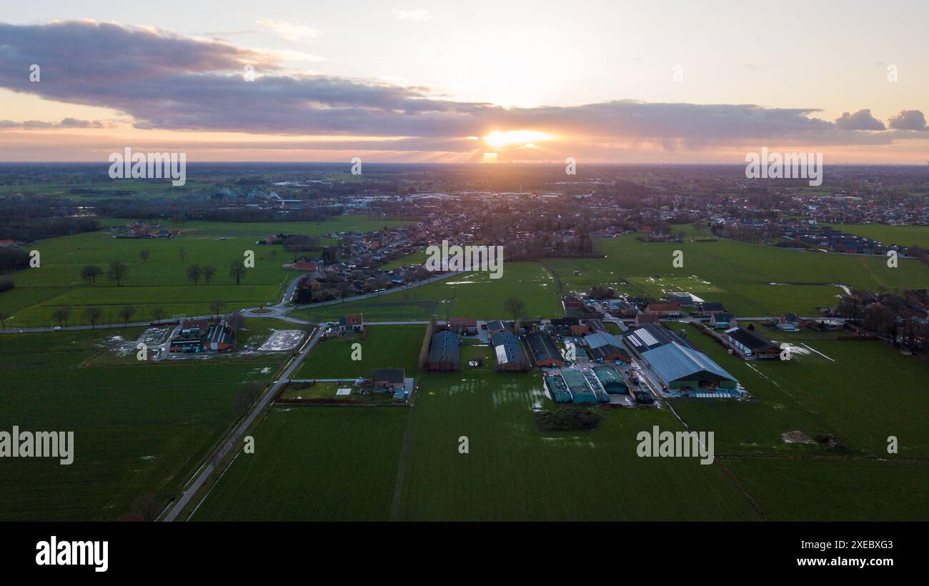 Dusk Settles Over Rural Town with Glowing Sunset Horizon Stock Photo ...