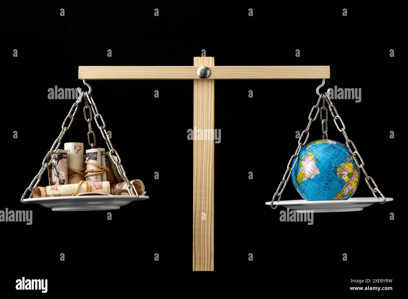 Balance scales globe hi-res stock photography and images - Alamy