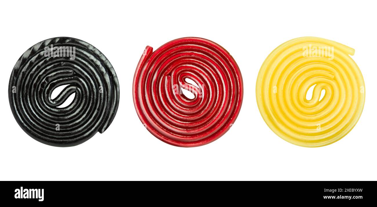Sweets black red yellow isolated on white background Stock Photo - Alamy