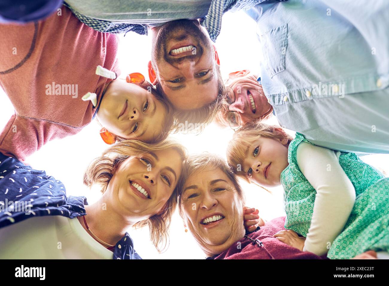 Outside, happy and portrait of family in circle, connection and bonding ...