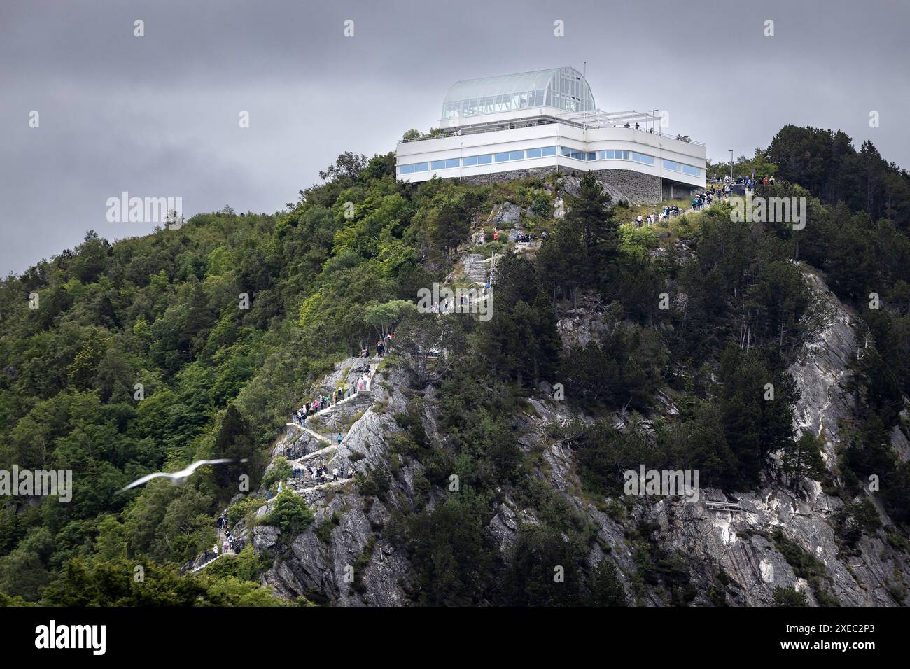 Thousands of tourists are pictured walking up the 418 steps to the ...