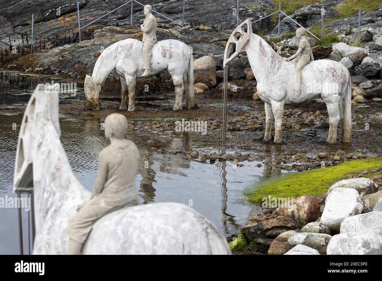 The Rising Tide sculpture of horses in the water, created by the artist ...