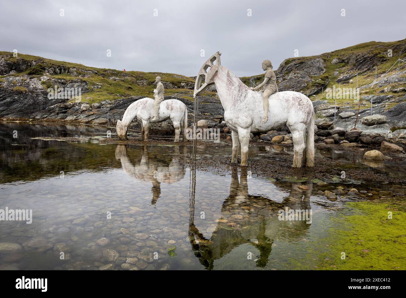 The Rising Tide sculpture of horses in the water, created by the artist ...