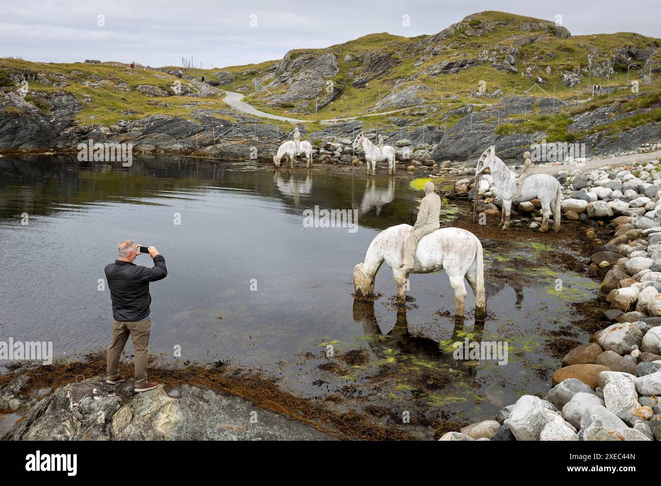 The Rising Tide sculpture of horses in the water, created by the artist ...