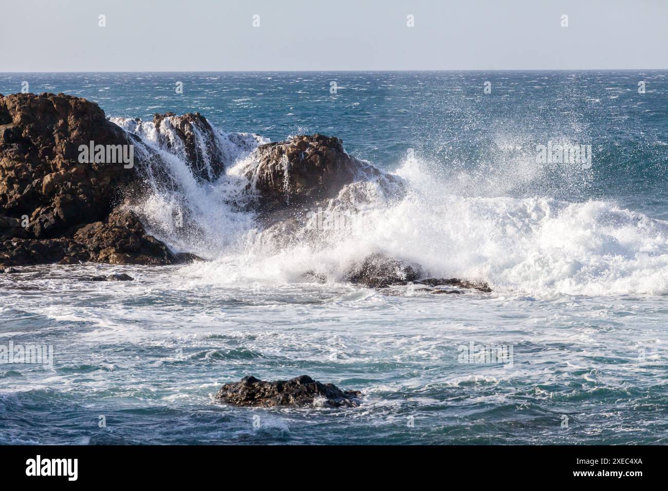 Ocean waves crash against black hi-res stock photography and images - Alamy