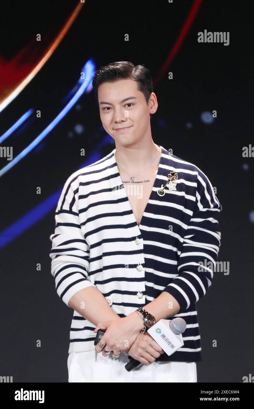 Hong Kong singer, dancer and actor William Chan attends an activity in ...