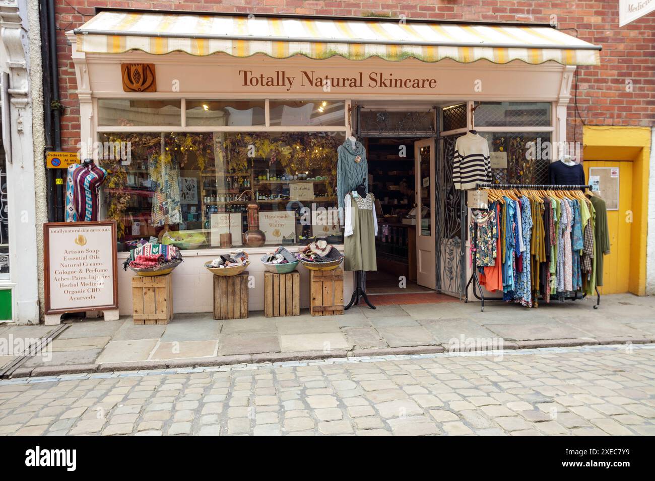 Local business shop front in Whitby, North Yorkshire on a busy Bank ...