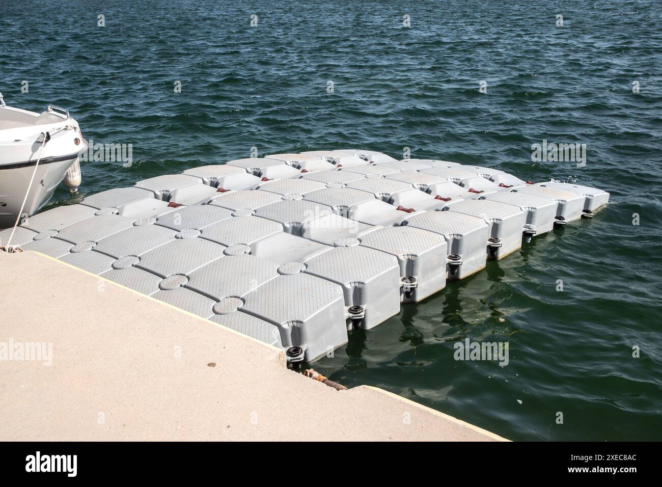 Plastic Modular Floating Dry Dock for Boats closeup on sunny day Stock ...