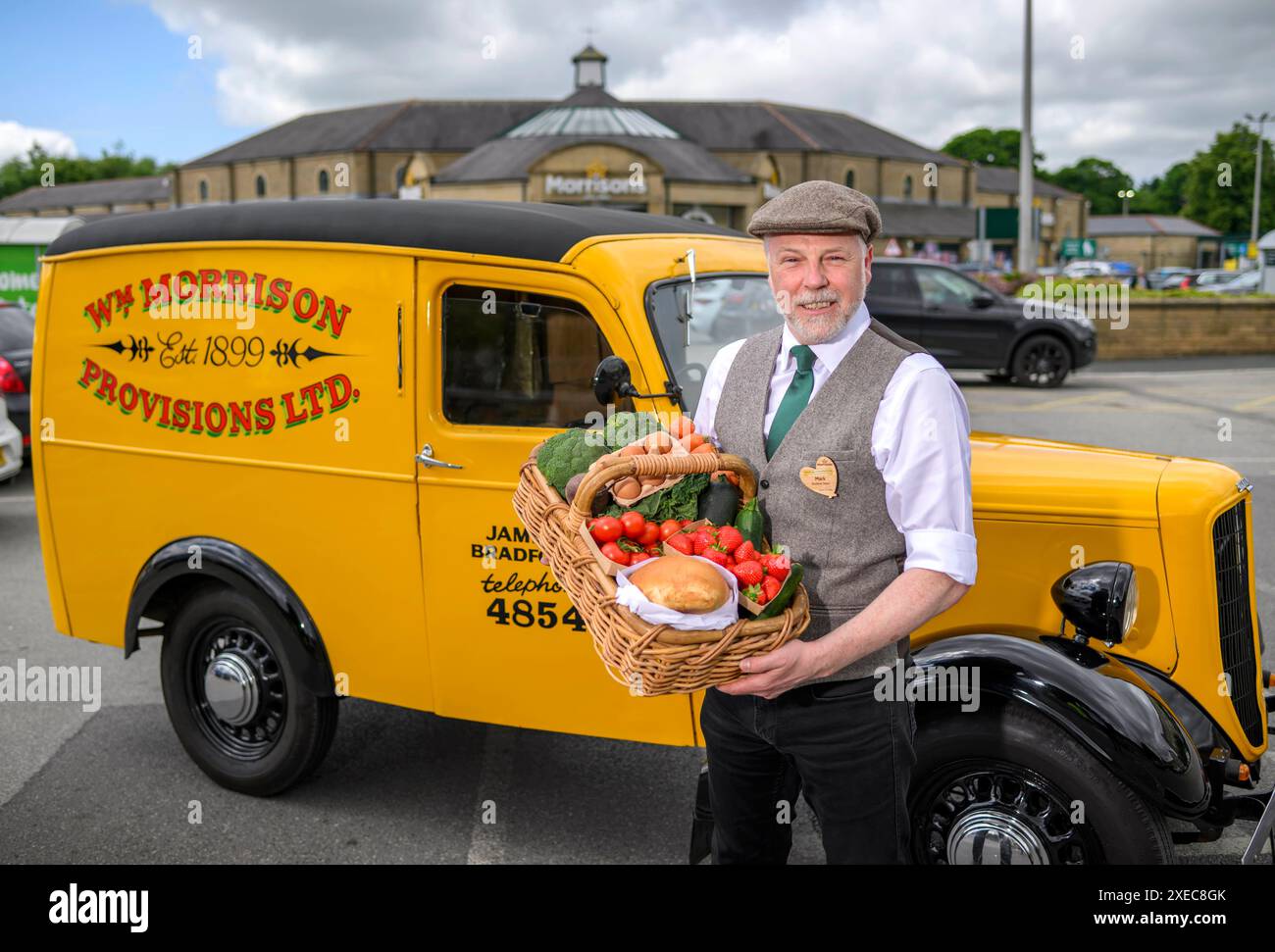 EDITORIAL USE ONLY Mark Thompson with a vintage Morrisons delivery van ...