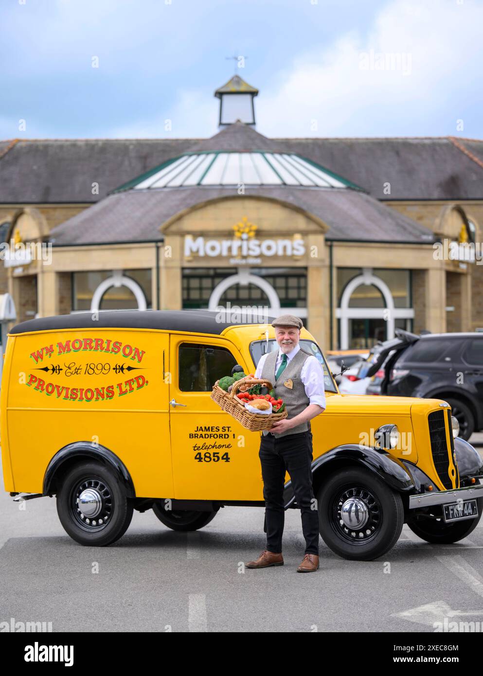 EDITORIAL USE ONLY Mark Thompson with a vintage Morrisons delivery van ...
