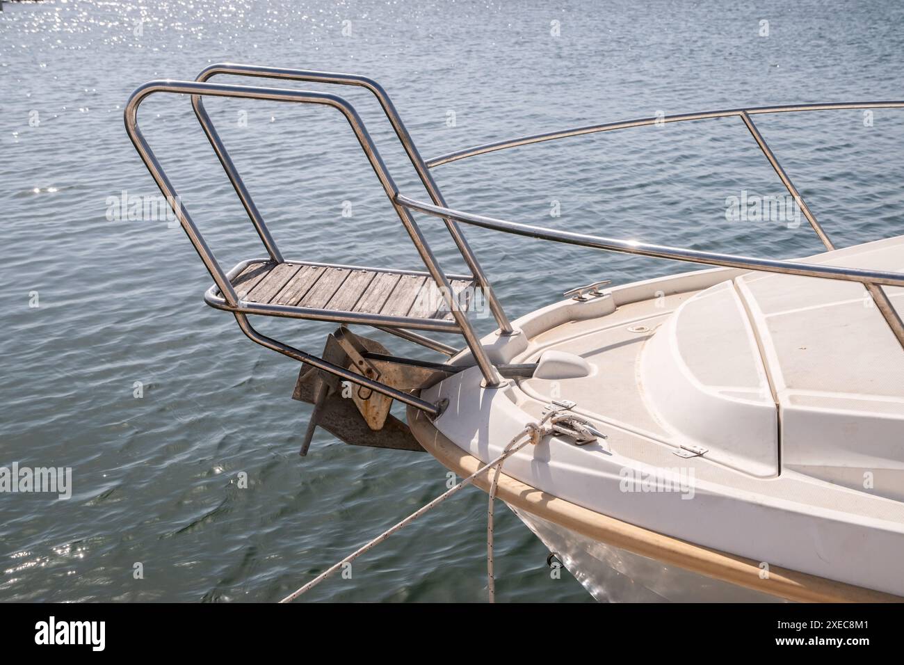 Sailing boat bow with mantus anchor on sea waters background Stock ...