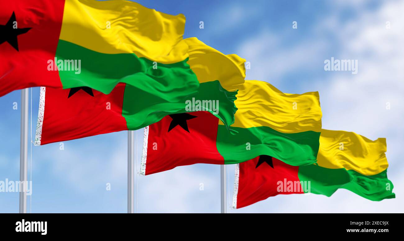 National flags of Guinea-Bissau waving in the wind on a clear day Stock ...