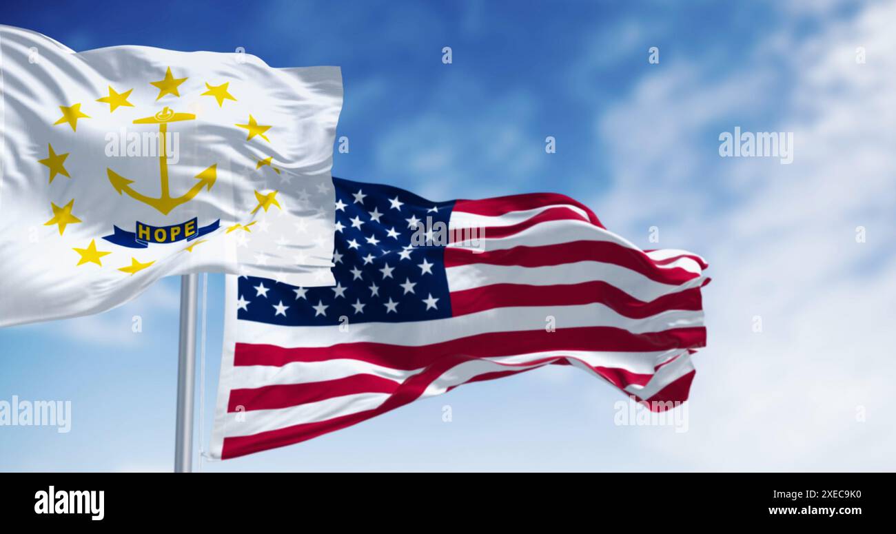Rhode Island state flag waving with the american flag on a clear day ...