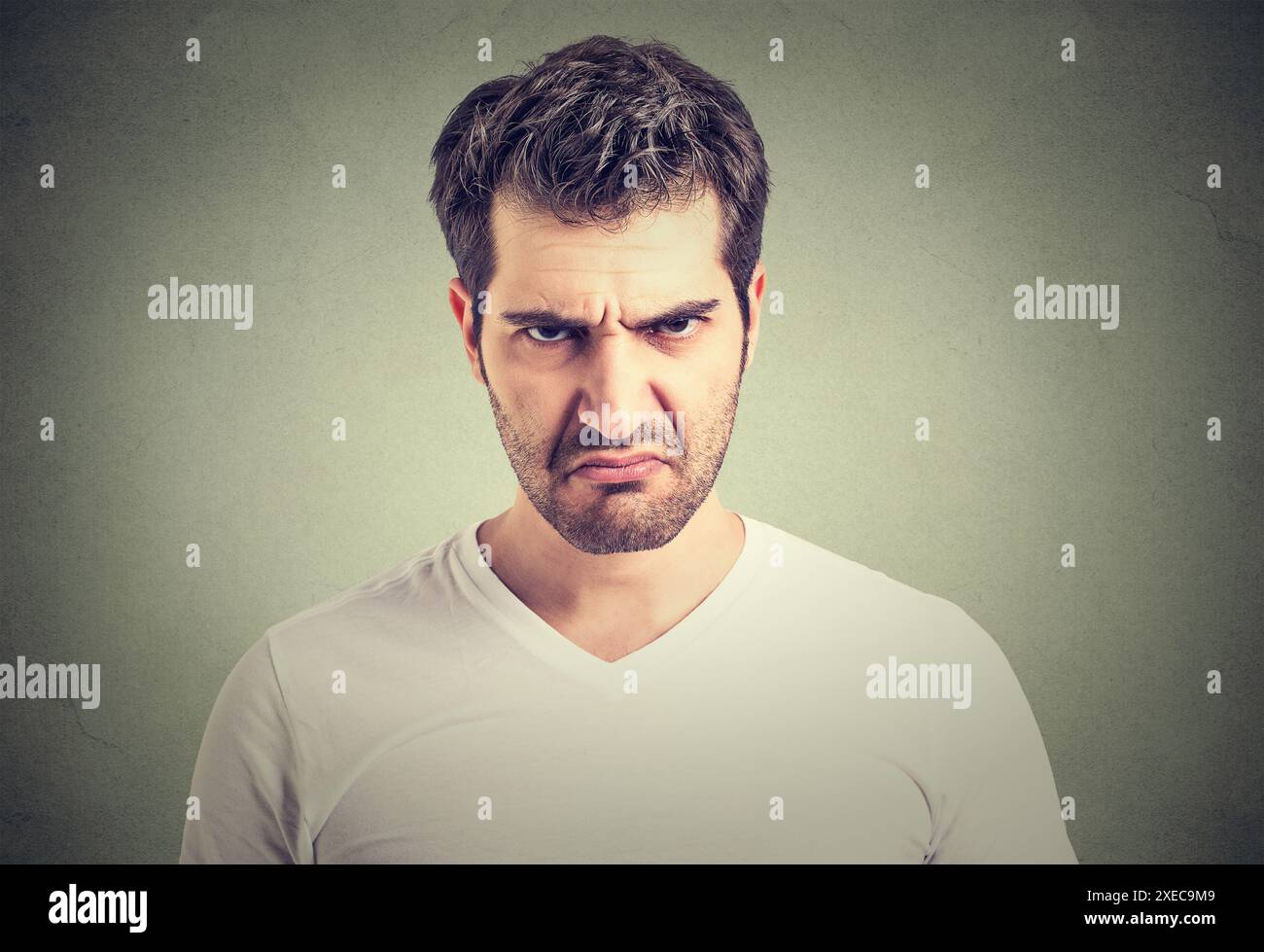 Closeup portrait of an angry grumpy young man Stock Photo - Alamy