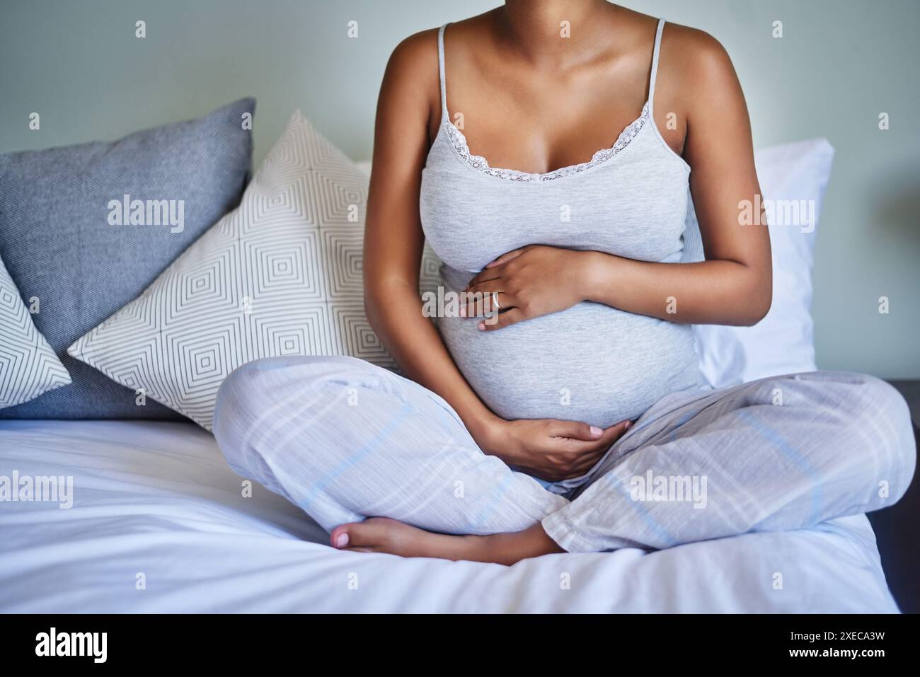 Mother, pregnant and hands on stomach for pregnancy, bonding and ...