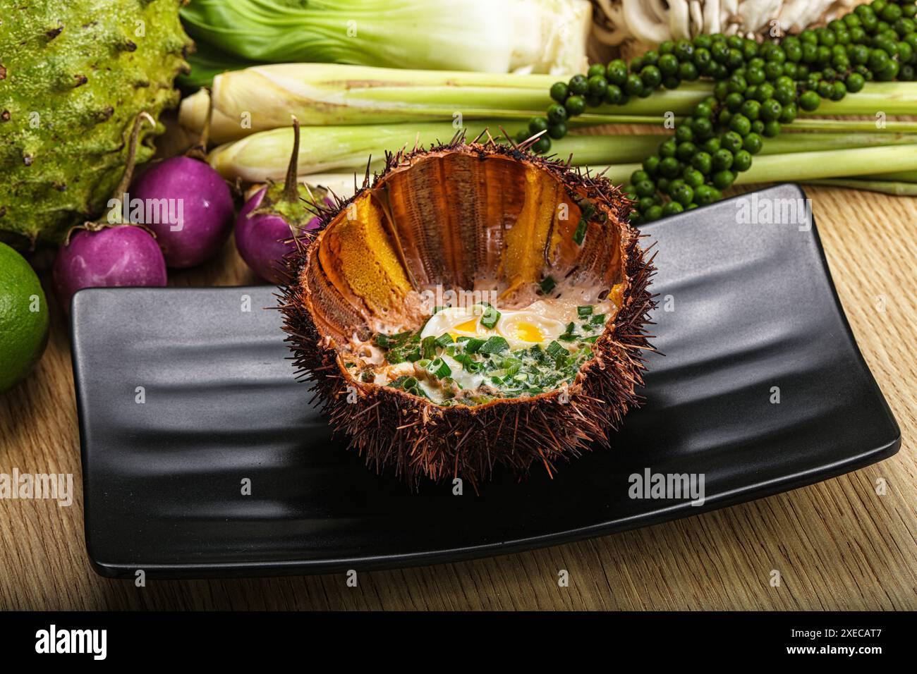 Delicous Grilled Sea Urchin with egg Stock Photo - Alamy