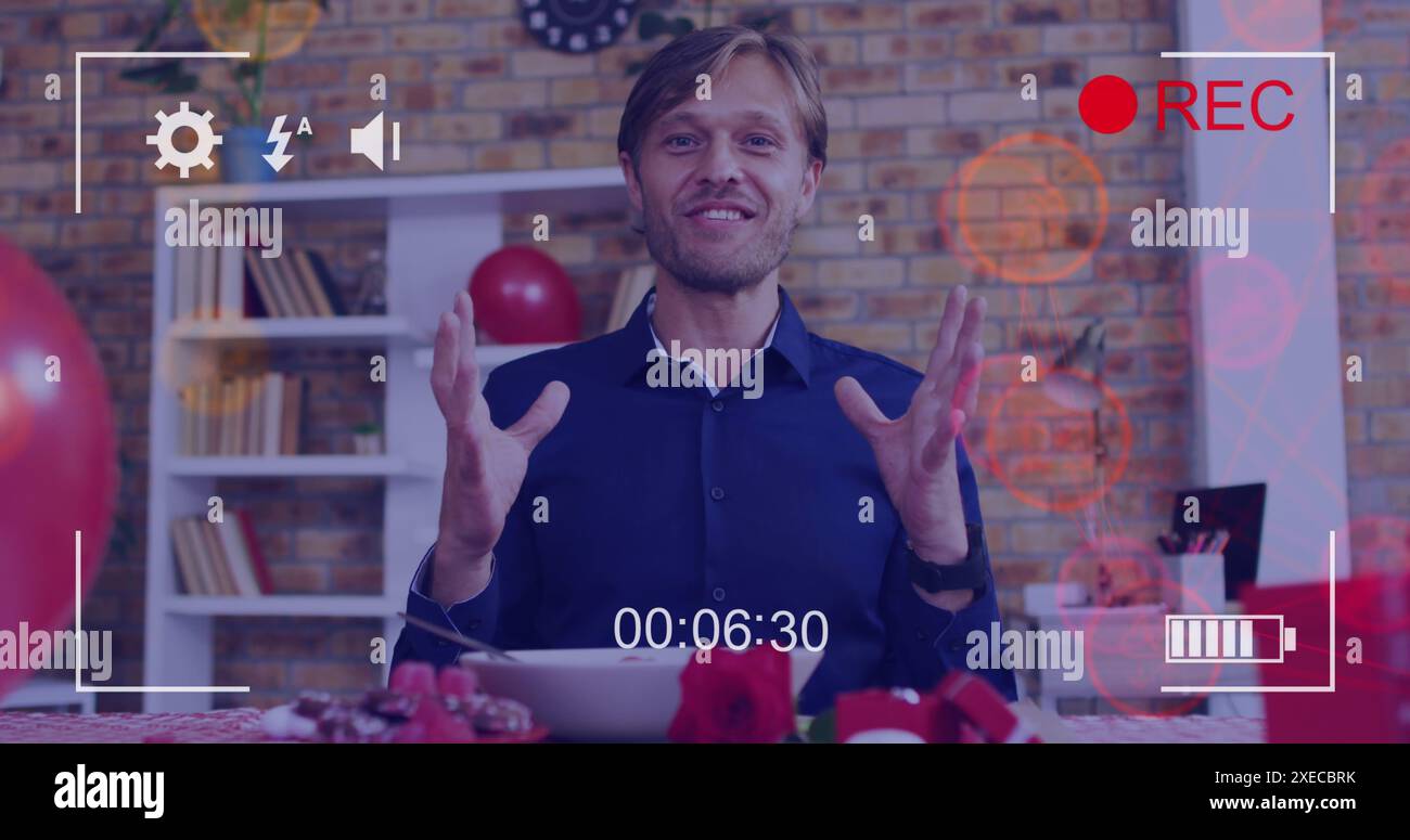 Image of icons and camera recording screen over caucasian man having ...