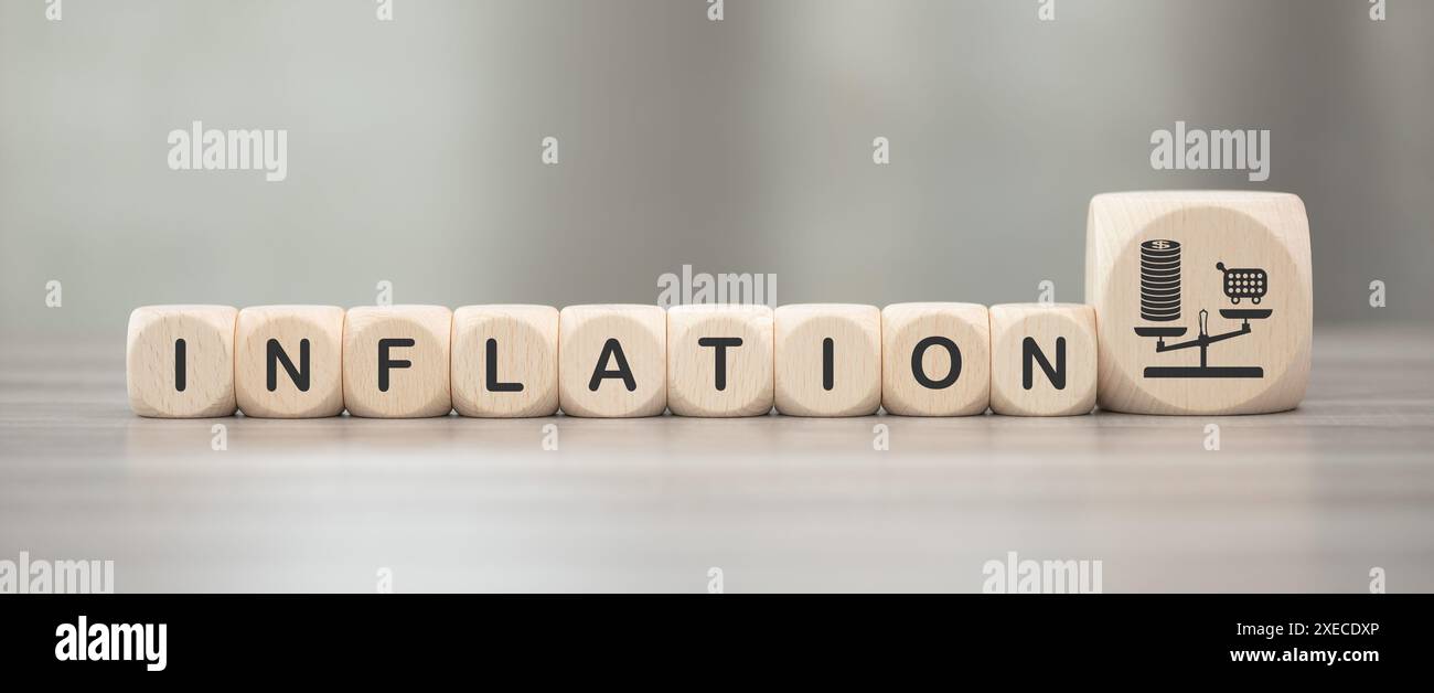 Wooden blocks with symbol of inflation concept Stock Photo - Alamy