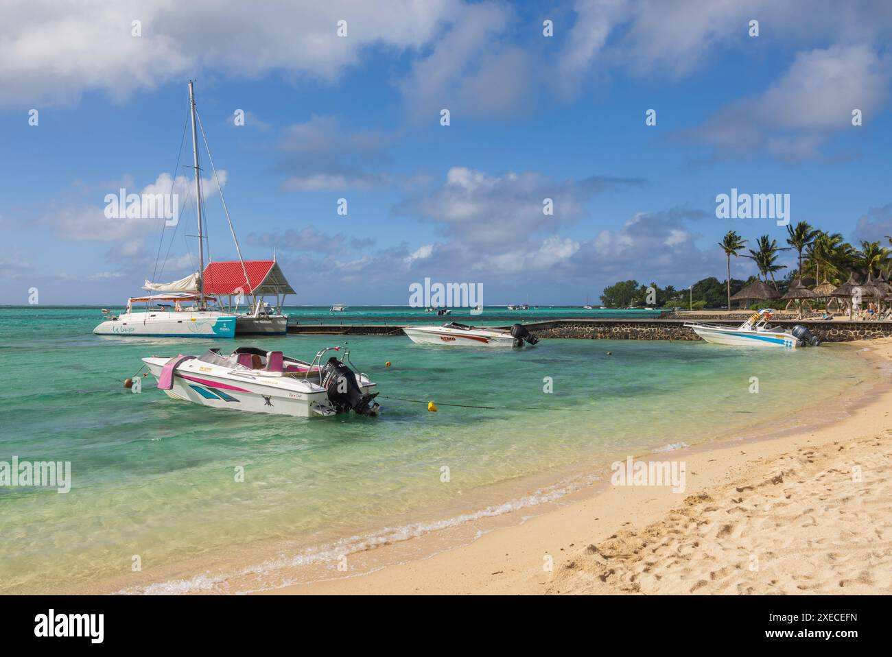 Boats moored on the lagoon at Preskil Island Resort near Pointe Jerome ...