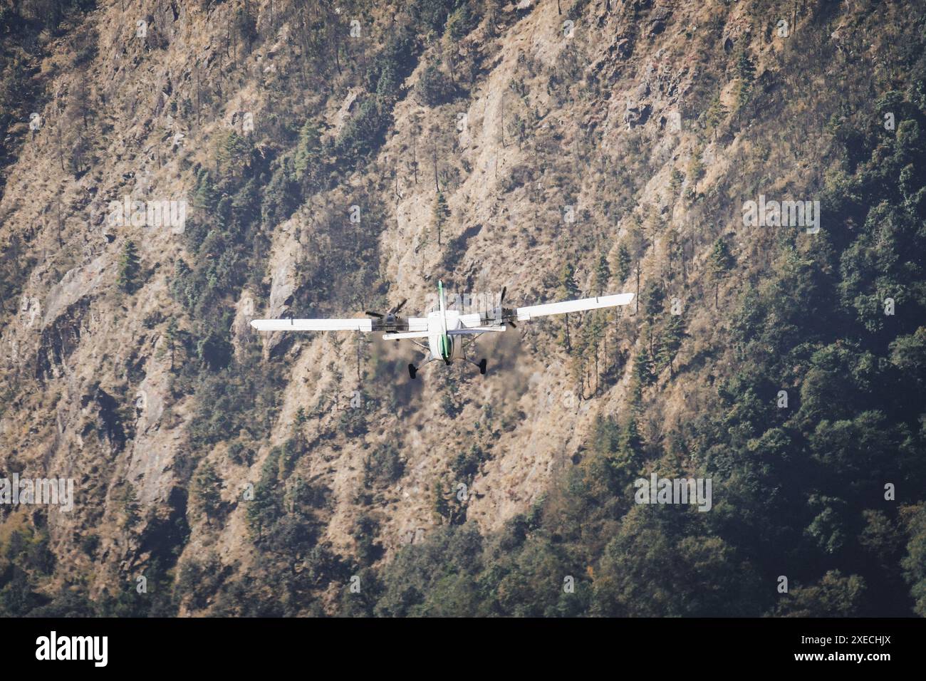 Lukla, Nepal - 14th november, 2023: small aircraft takes off on the ...