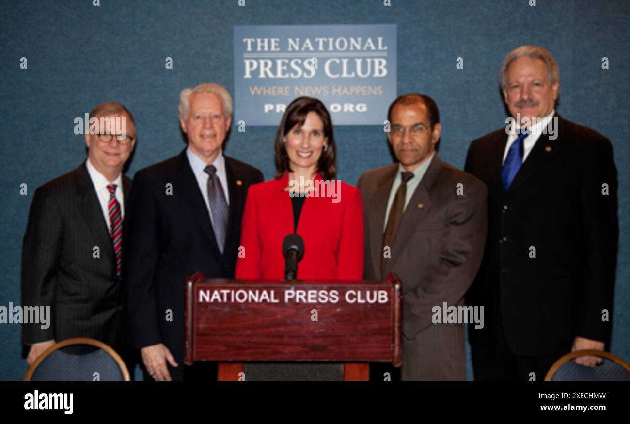 The five-member Board poses for a photo following the unveiling of the ...