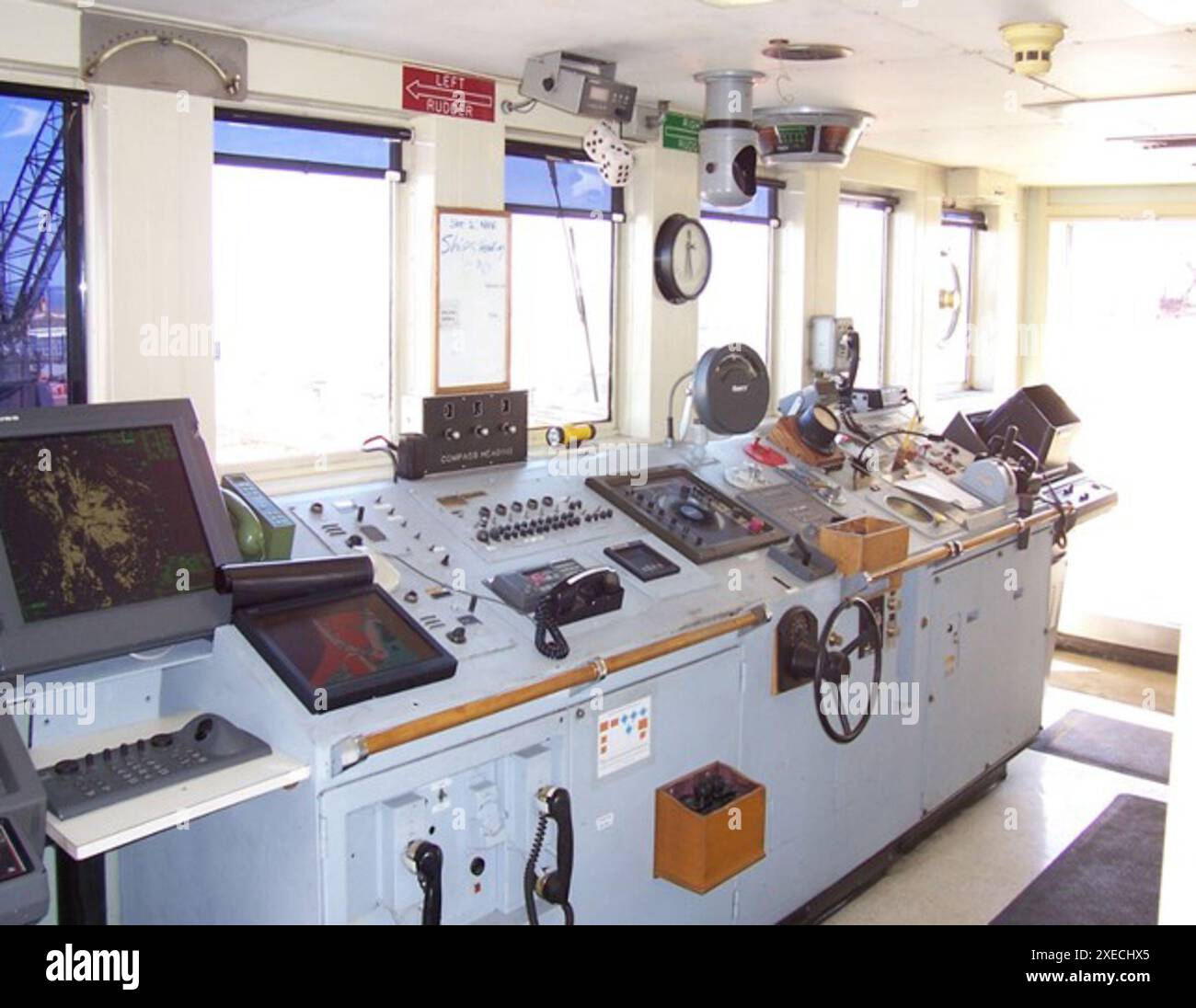 Photo of the El Faro bridge. The ship's wheel and engine order ...