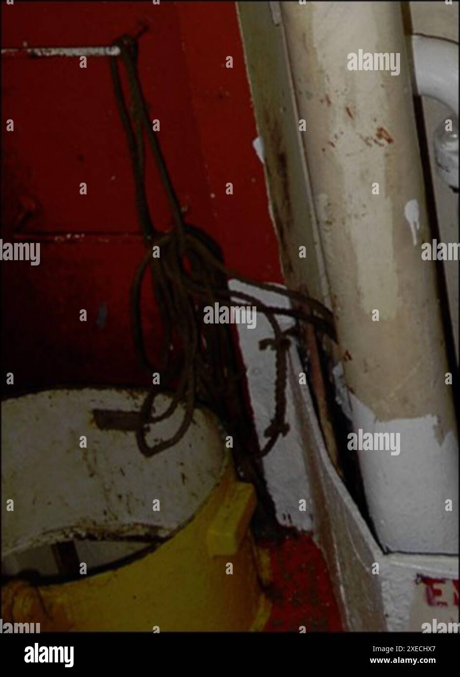 A photograph showing a portion of the yellow open scuttle hatch on the ...