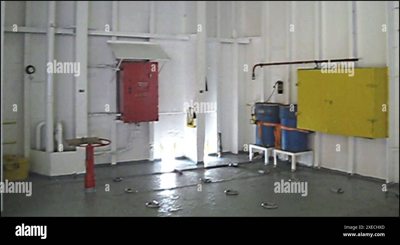 Photo of El Faro 2nd deck. In the lower left corner, a hatch with a 12 ...