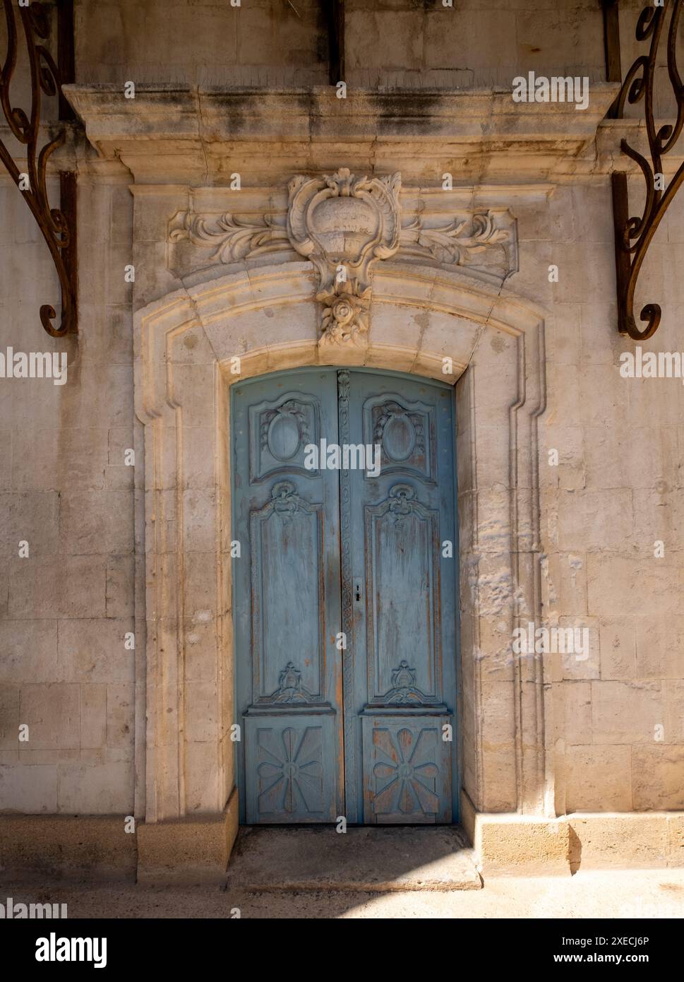 Imposing blue door at the highly ornate historic 18th century Cavaillon ...