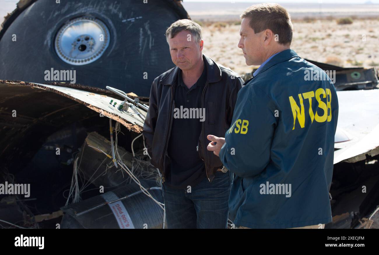 Virgin Galactic pilot Todd Ericson talks with NTSB investigator Joe ...