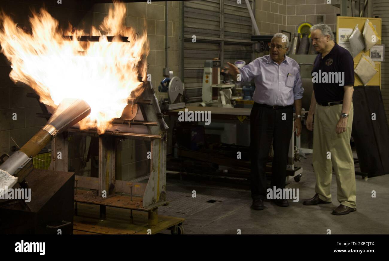 NTSB Board Member Mark R. Rosekind watches a fire insulation test at ...