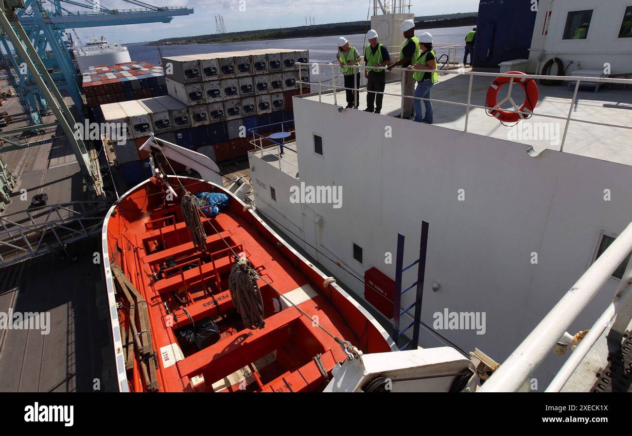 Same caption for both of these photos: NTSB investigators on El Yunque ...
