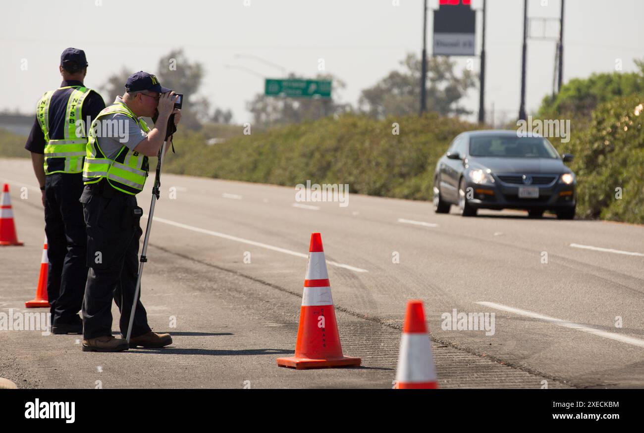 NTSB investigators surveying the accident scene. Orland, CA Highway ...