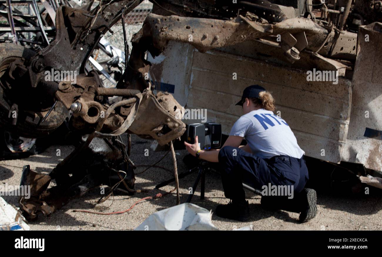 NTSB Mechanical Engineer Kristin Poland uses laser scanner to capture a ...