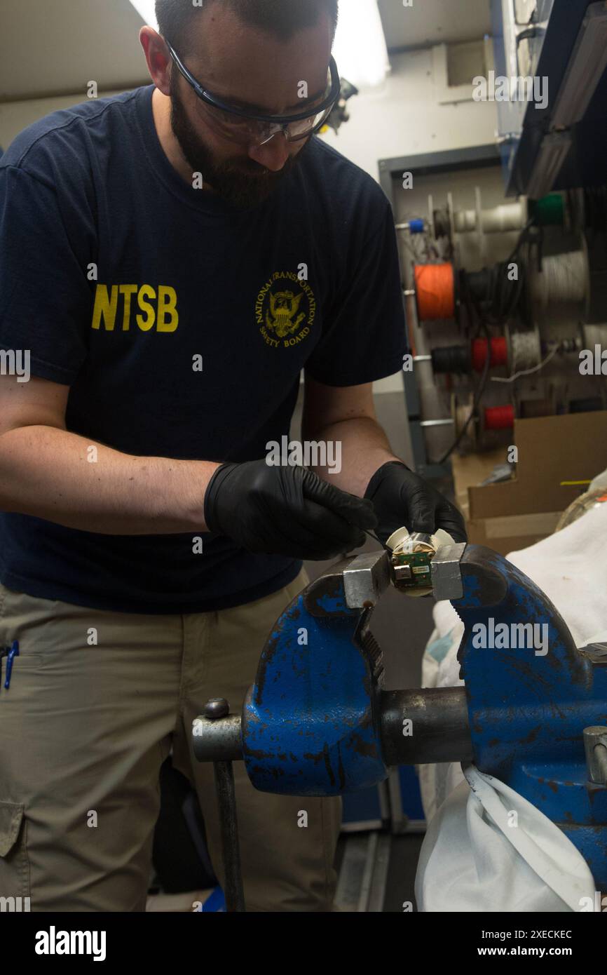 (ABOARD THE USNS APACHE, ATLANTIC OCEAN) — NTSB engineer Douglas ...