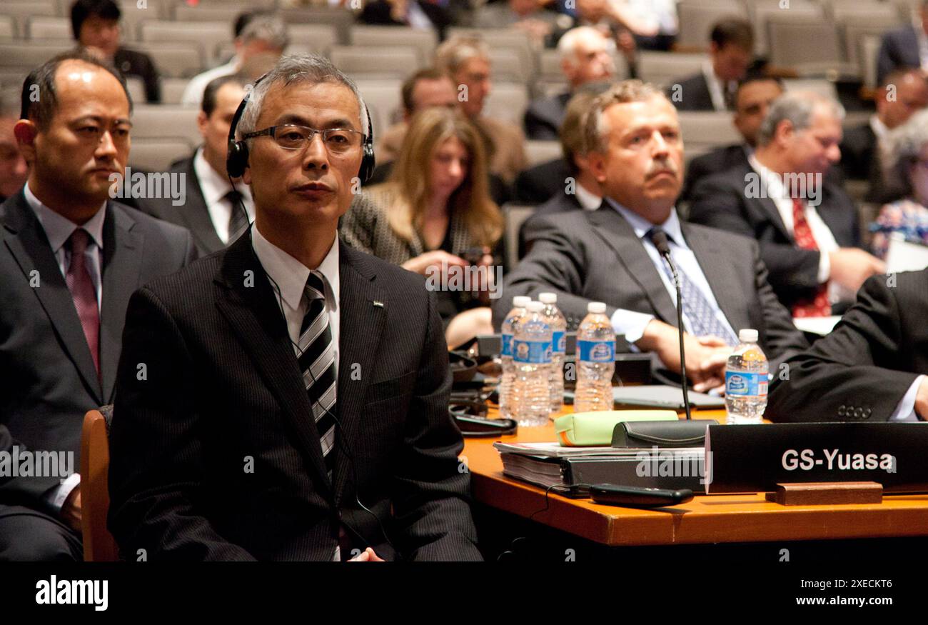 An official from GS-Yuasa listens to testimony during the 787 battery ...