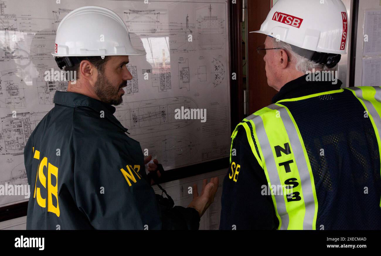 NTSB Board Member Earl Weener and IIC Eric Stolzenberg onboard the M/V ...