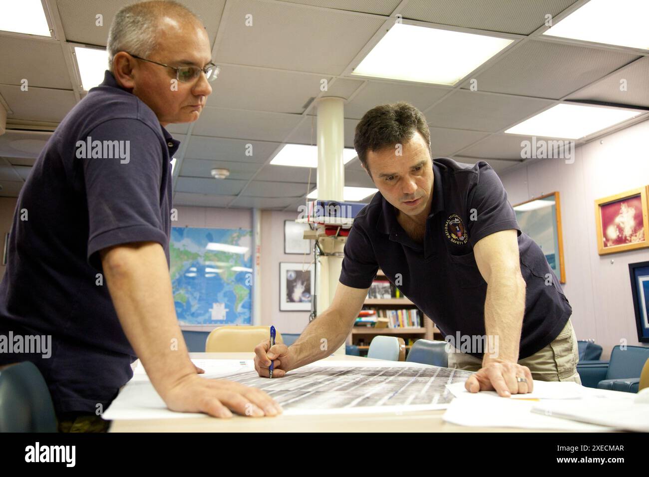 NTSB Marine Safety Investigator Eric Stolzenberg (right) aboard ...
