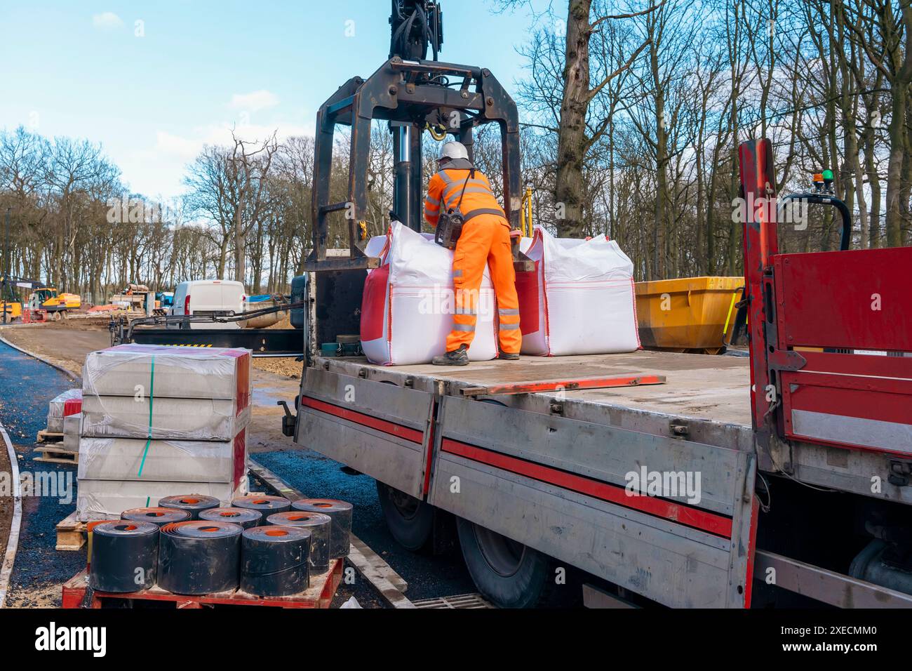 Dropside flatbed HIAB crane lorry with brick grab attachment deliver ...