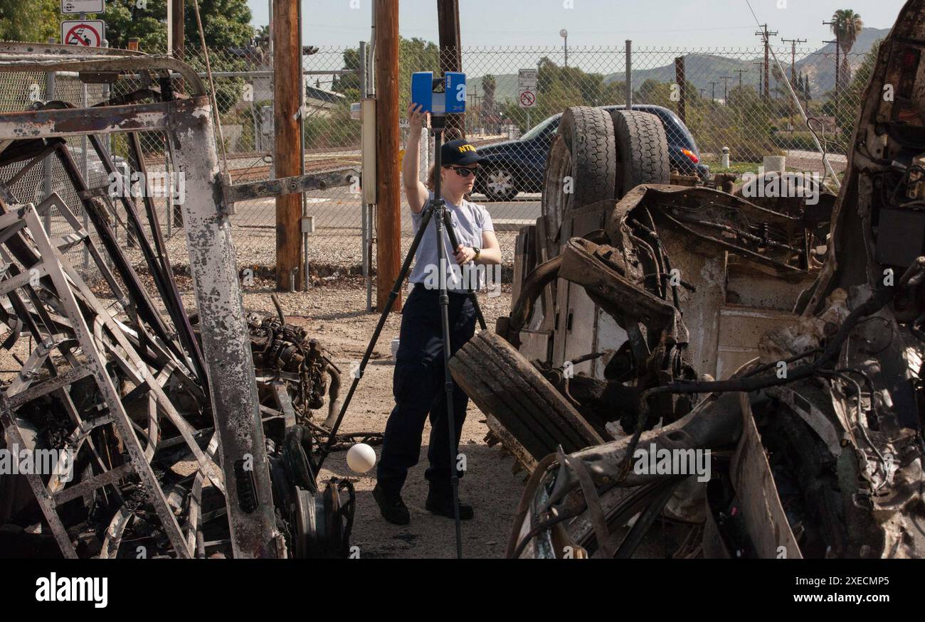 NTSB Mechanical Engineer Kristin Poland uses laser scanner to capture a ...