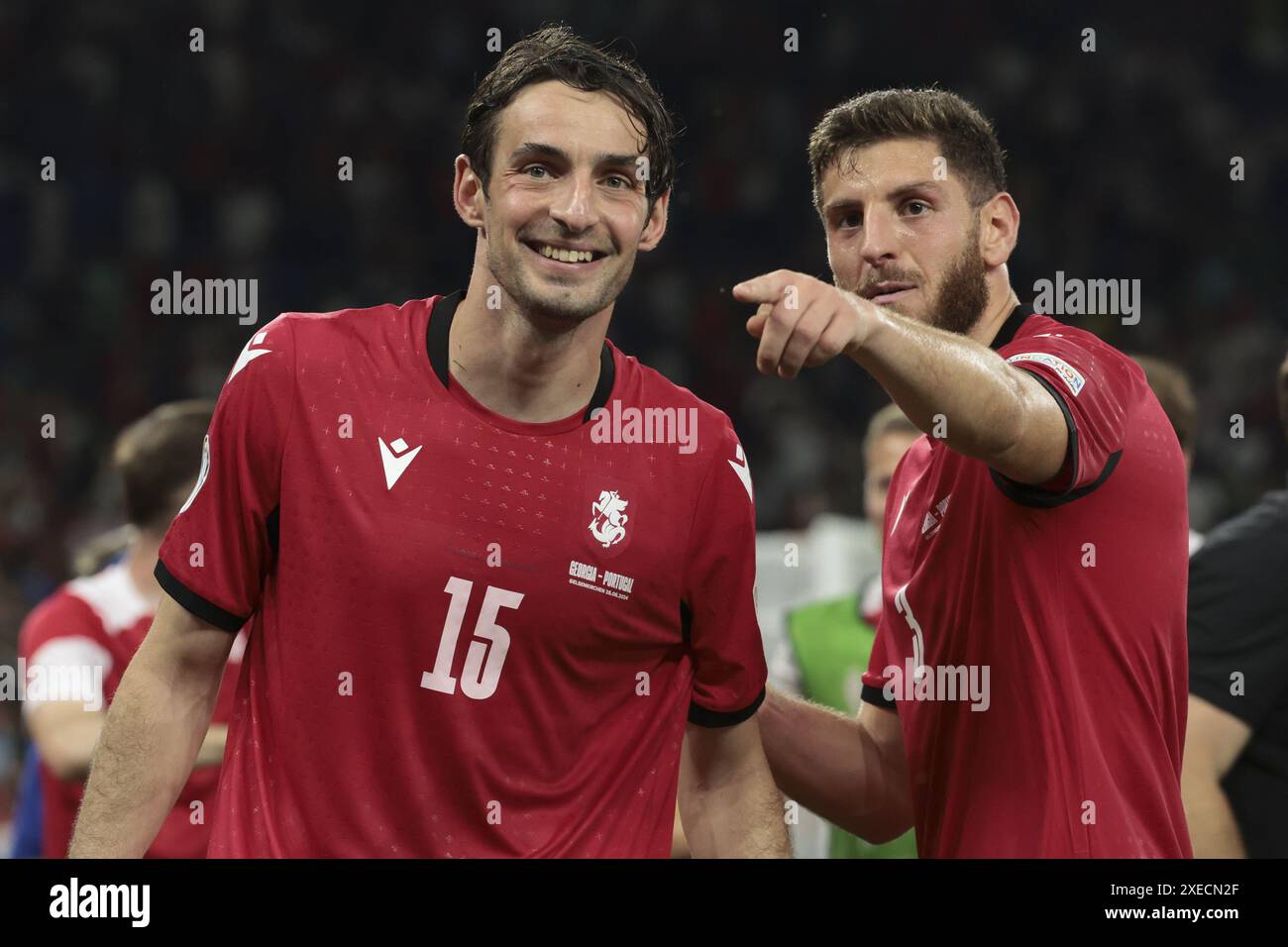 Gelsenkirchen, Germany June 26, 2024, Giorgi Gvelesiani, Lasha Dvali of Georgia celebrate the ...